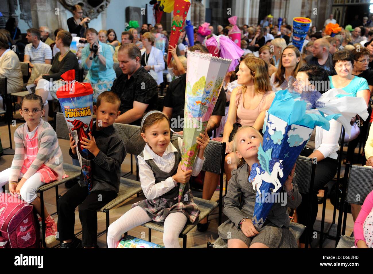 First graders celebrate their first day at school with a service in ...
