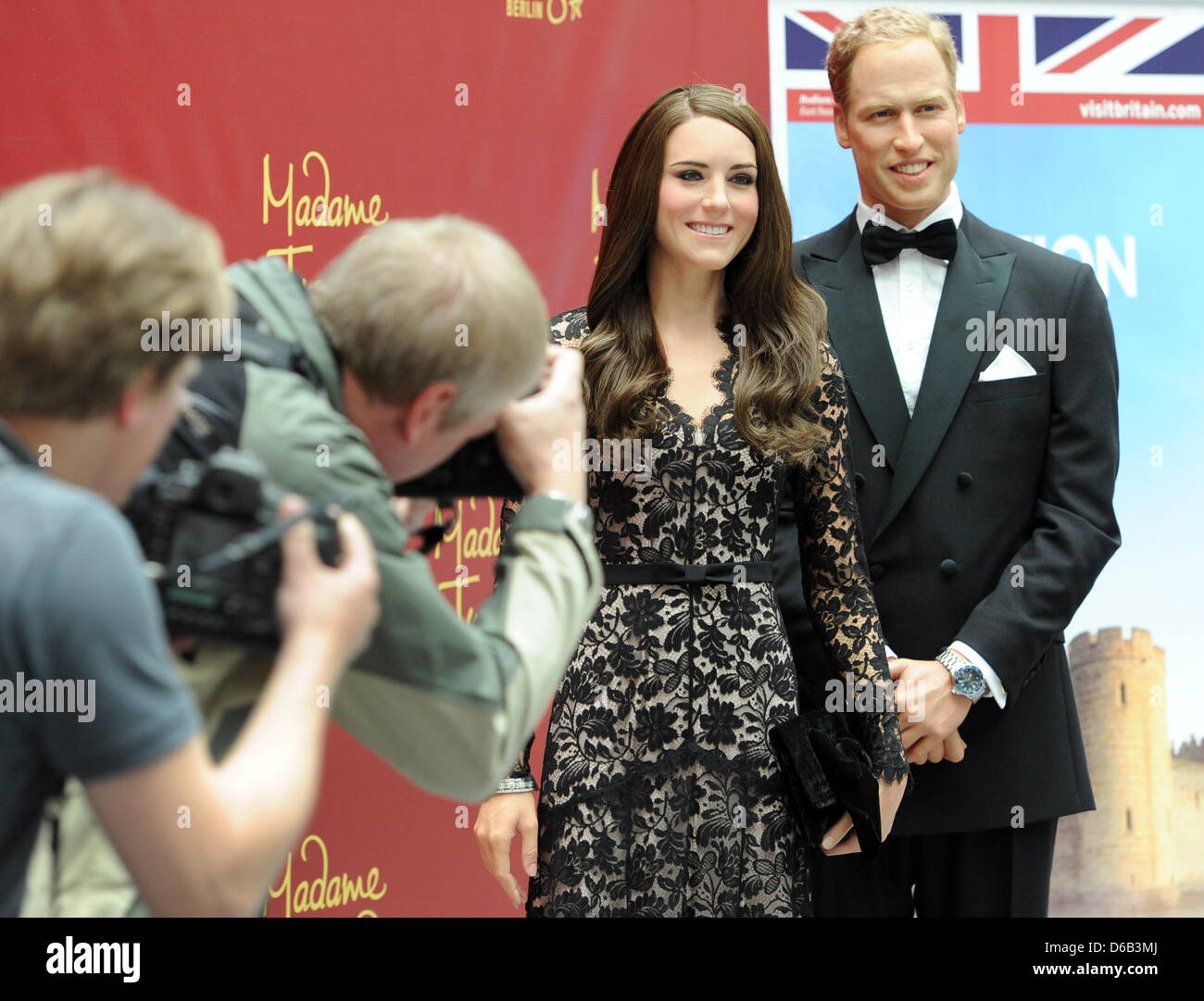 The wax figures of Prince William and Duchess Kate stand at the British ...
