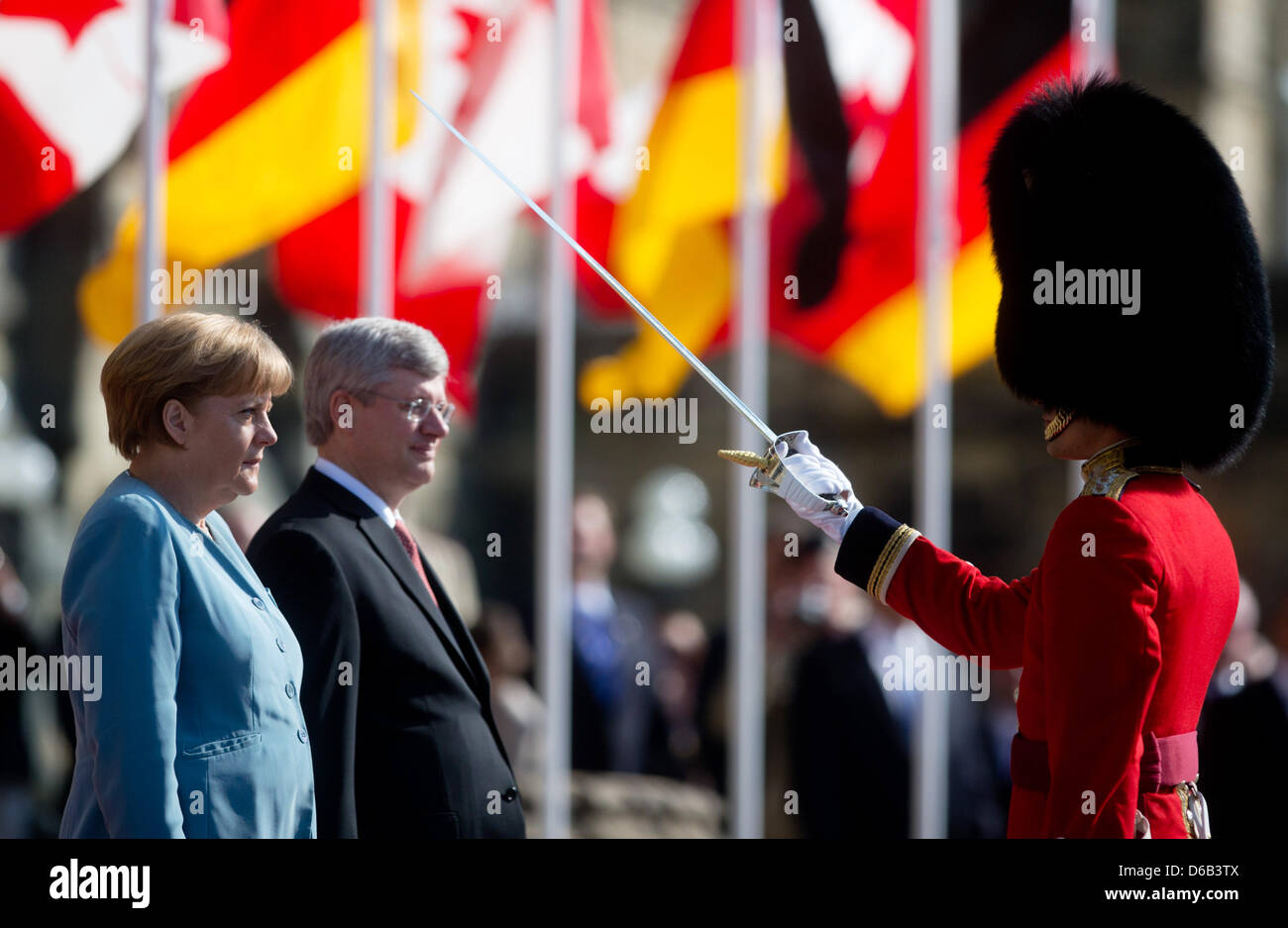 German Chancellor Angela Merkel (CDU) is welcomed by Canadian Prime ...