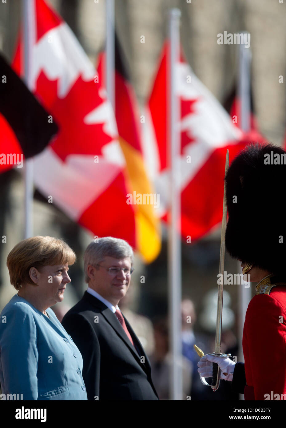 German Chancellor Angela Merkel (CDU) is welcomed by Canadian Prime ...