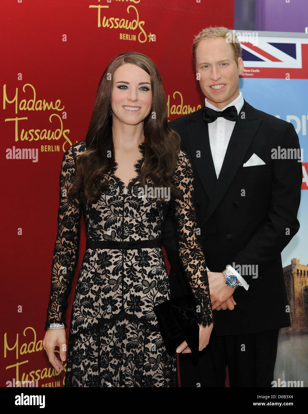 The wax figures of Prince William and Duchess Kate stand at the British ...