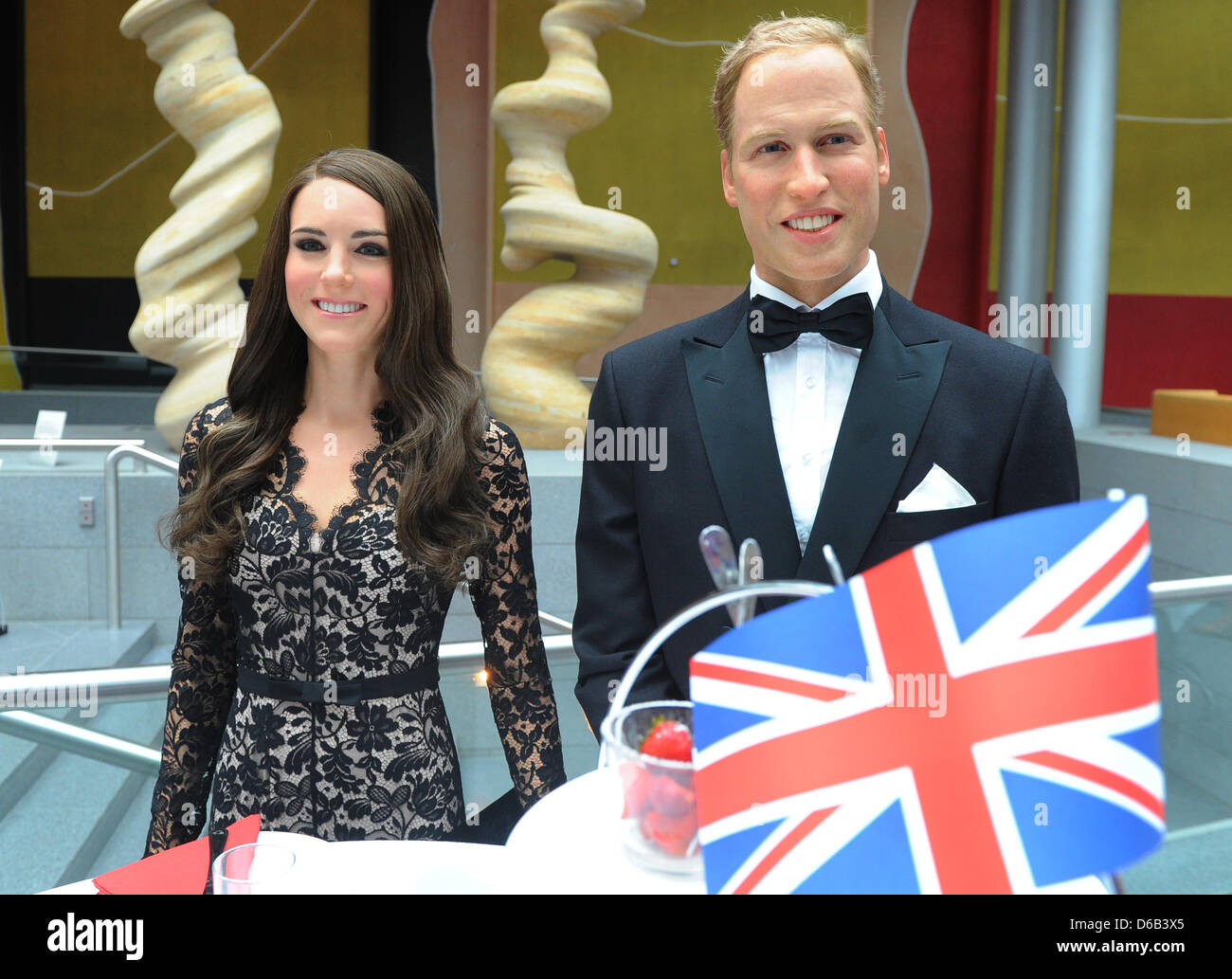 The wax figures of Prince William and Duchess Kate stand at the British ...