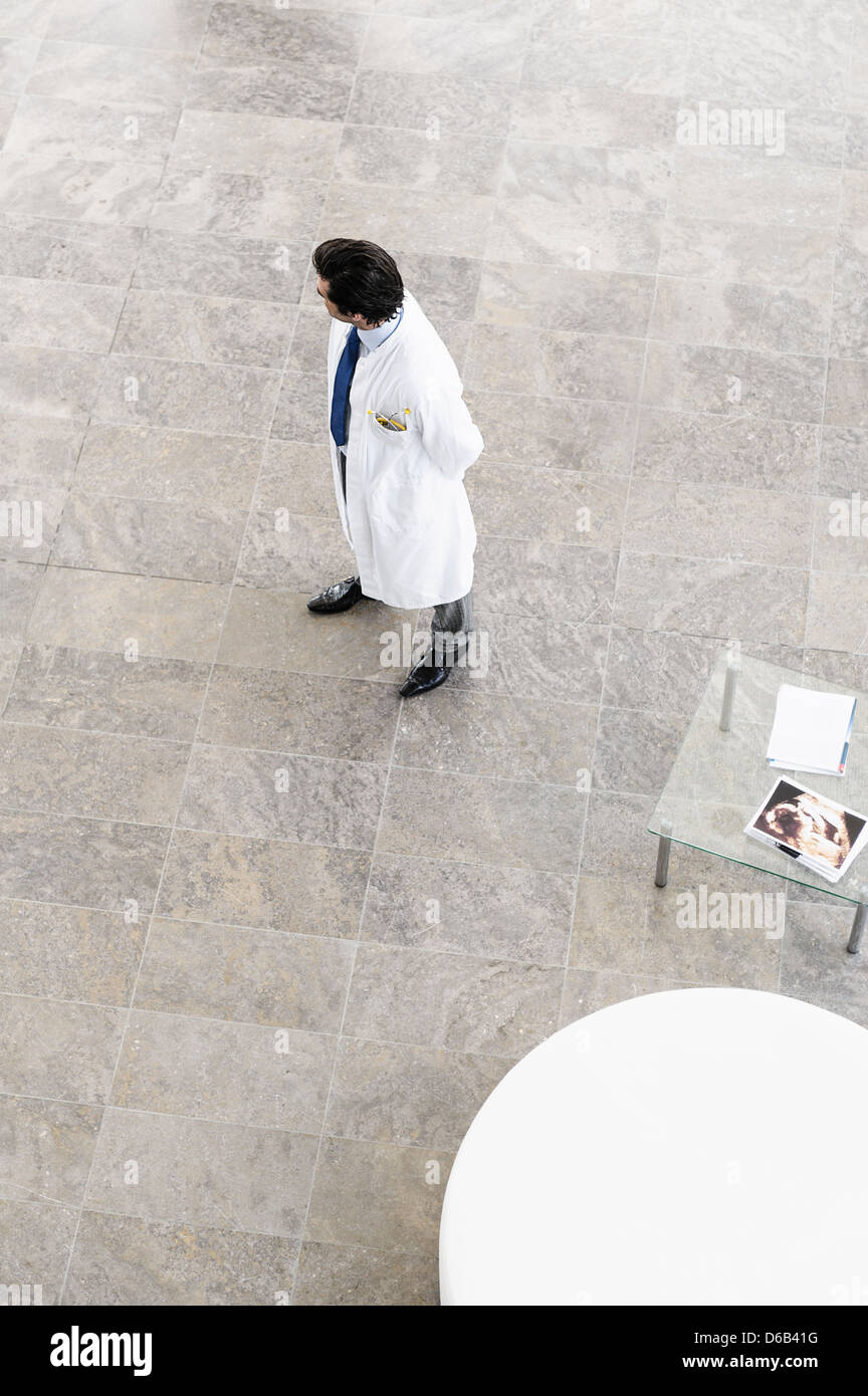 Overhead view of doctor in lobby Stock Photo - Alamy