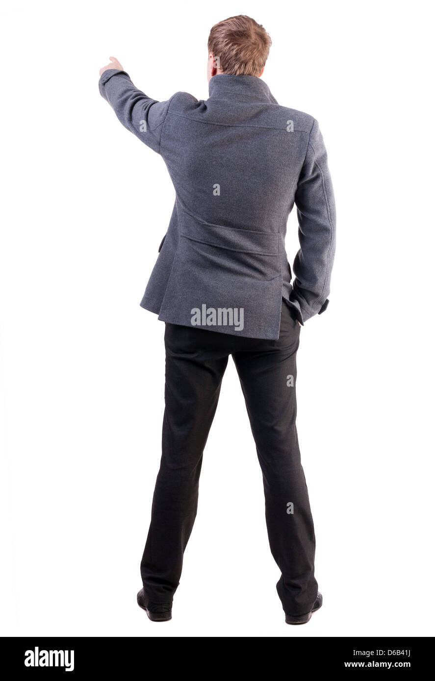 Back view of pointing young business men in coat. Blonde businessman ...