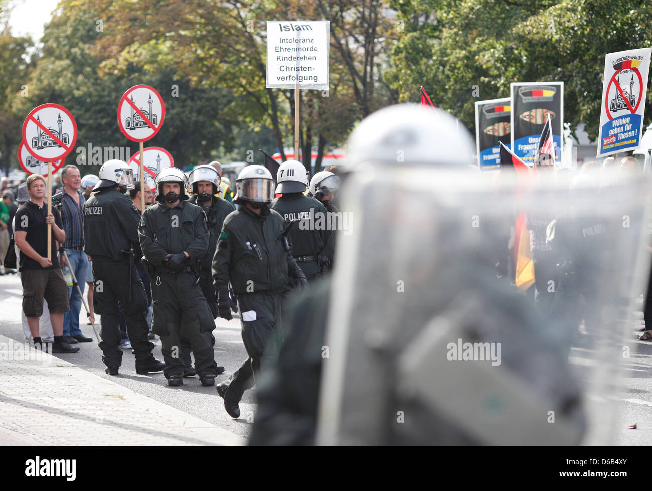 Police officers secure a rally of the far-right political party Pro ...