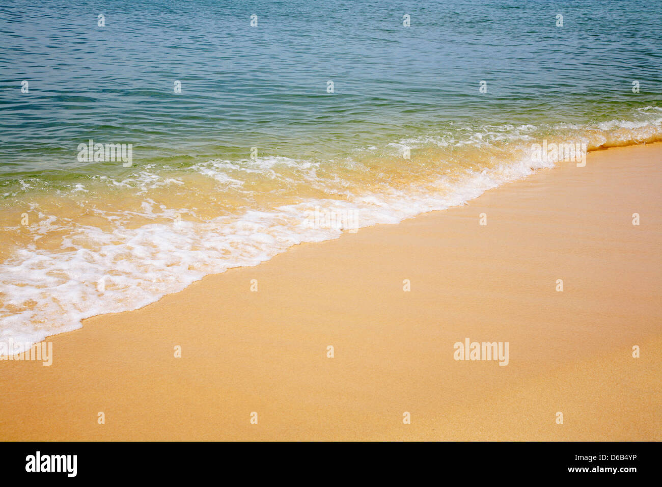 Waves on the beach Stock Photo - Alamy