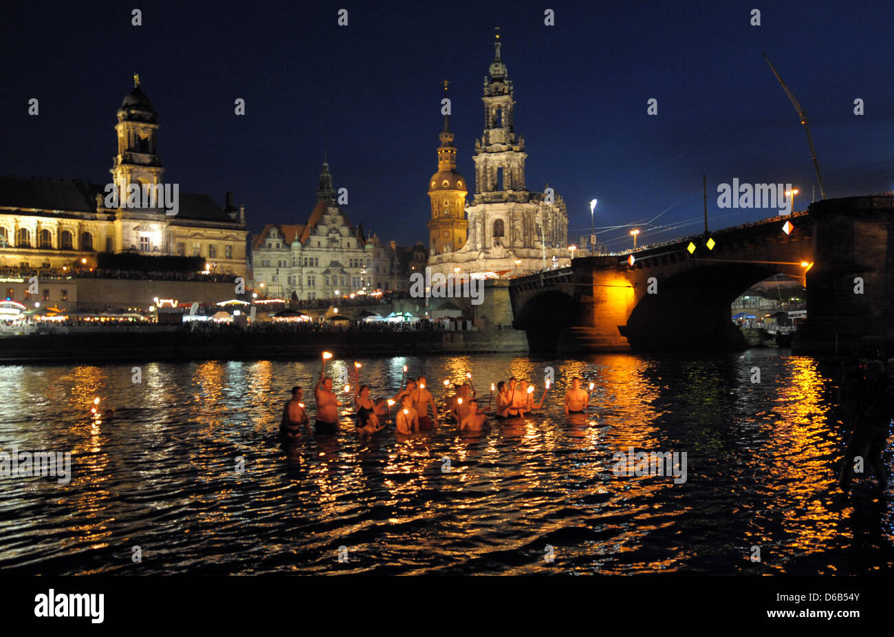 More than 70 swimmers take part in the 7th torch swimming event in ...