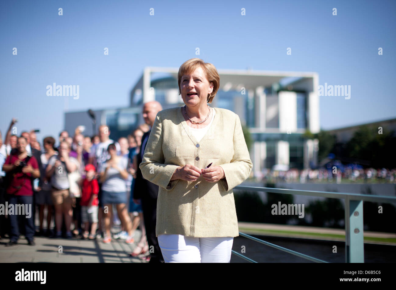German Chancellor Angela Merkel poses for photographers in front of the ...