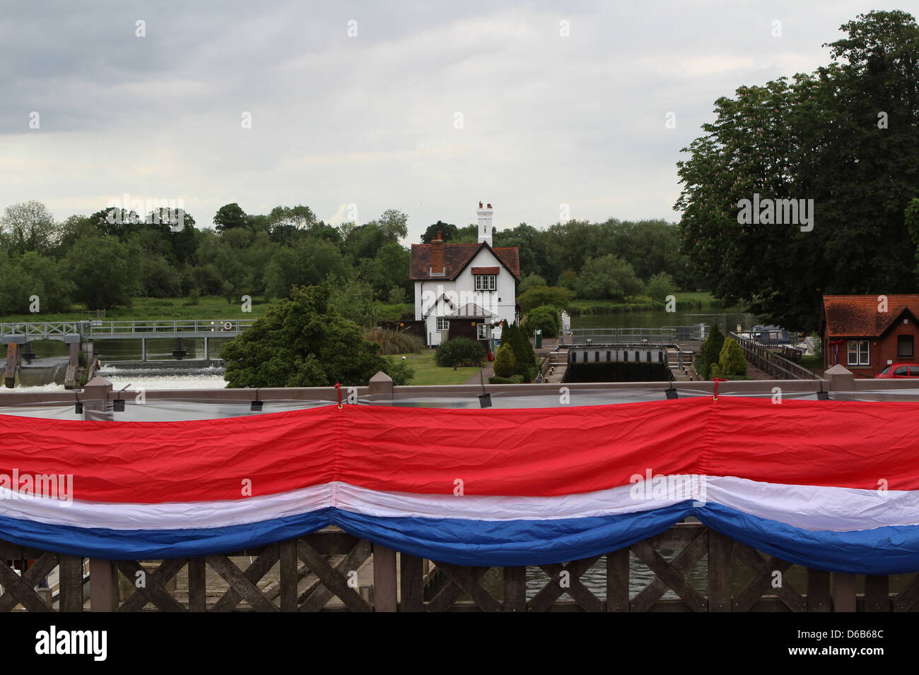 Goring bridge railing draped in the colors of the Union Jack during the ...