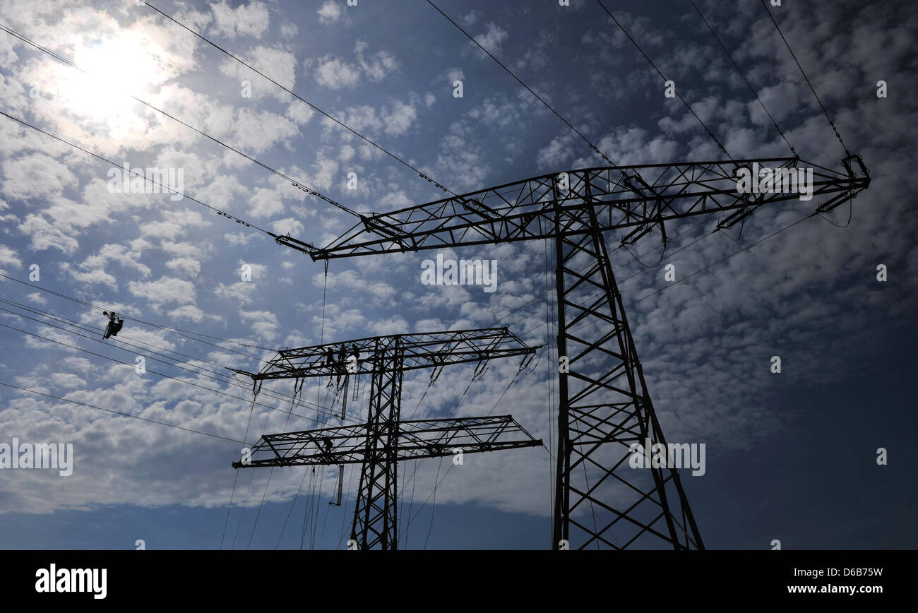 A worker connects wires from a cable-cycle near Erfurt, Germany, 21 ...