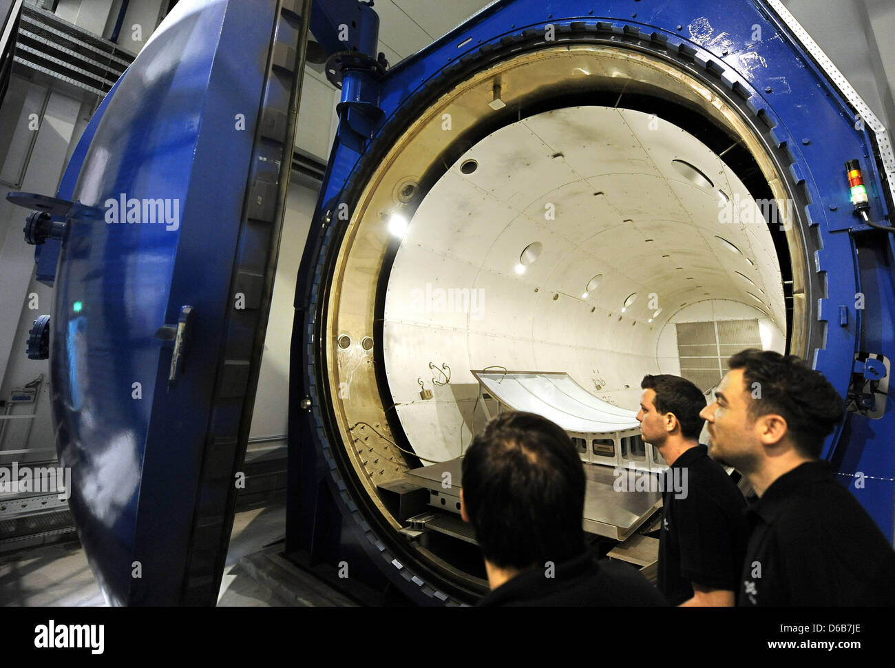Employees of the DLR view the closing of the door of the world's ... Employees of the DLR view the closing of the door of the world's ...
