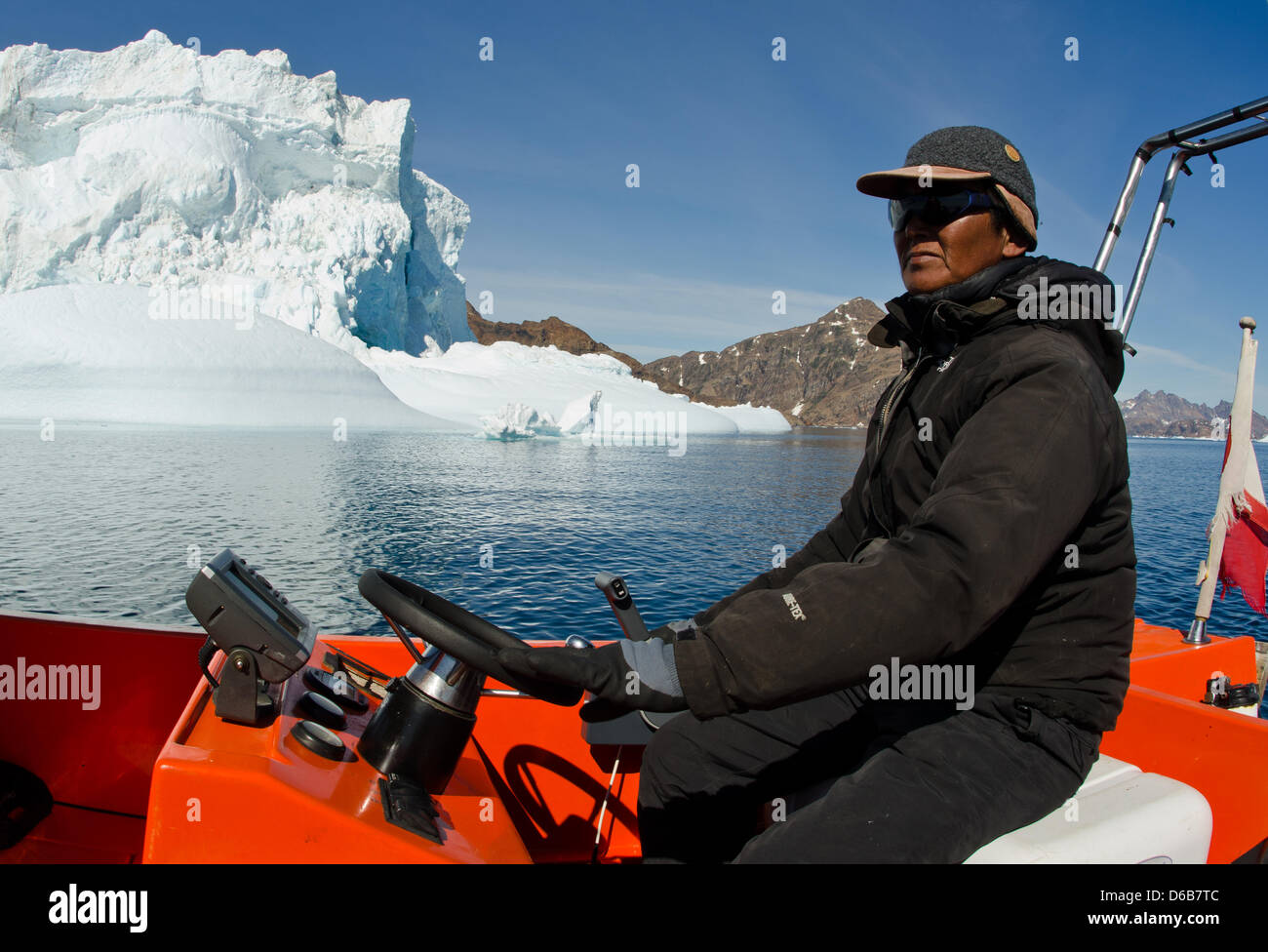 Inuit with motor boat hi-res stock photography and images - Alamy