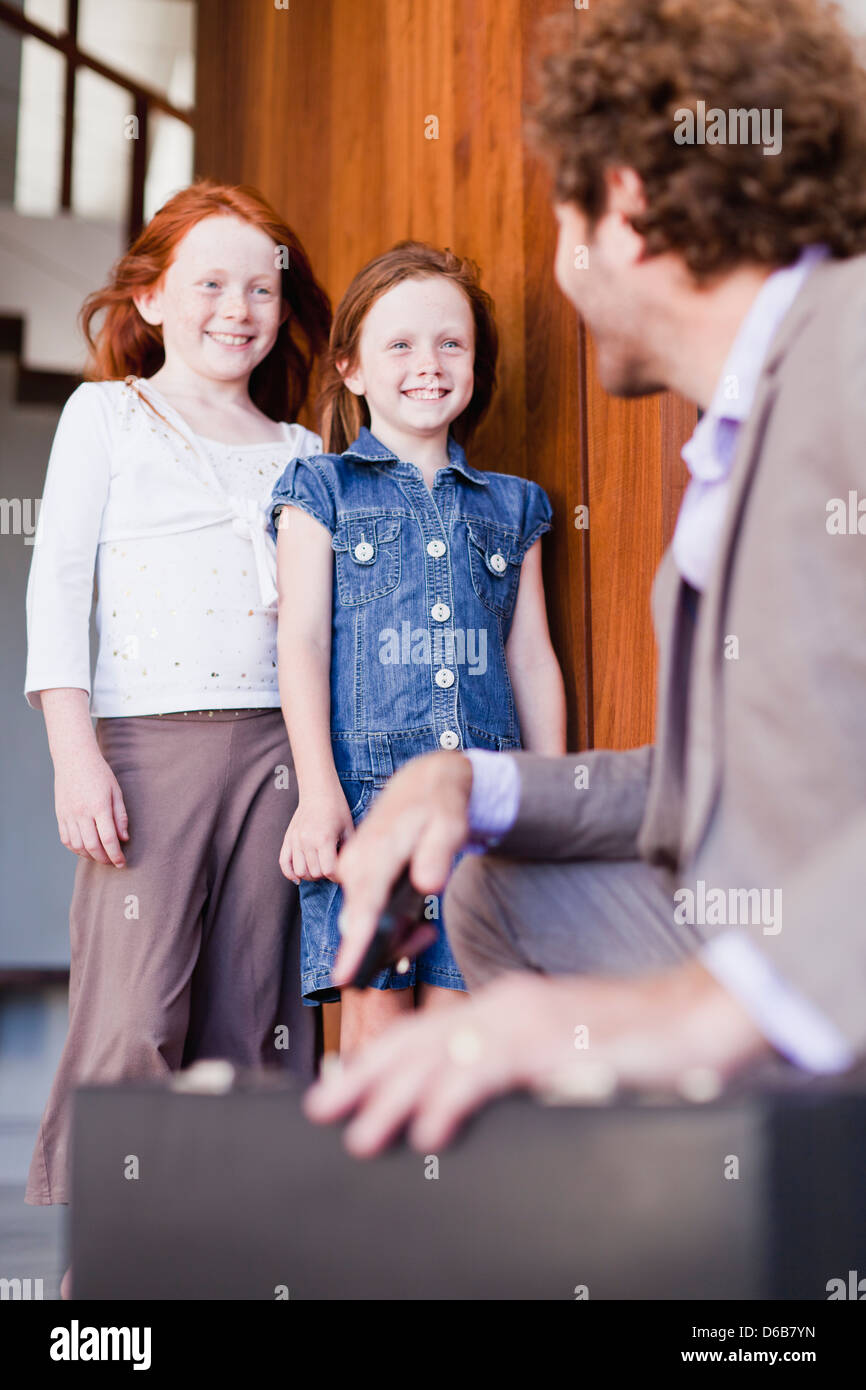 Father saying goodbye to family hi-res stock photography and images - Alamy