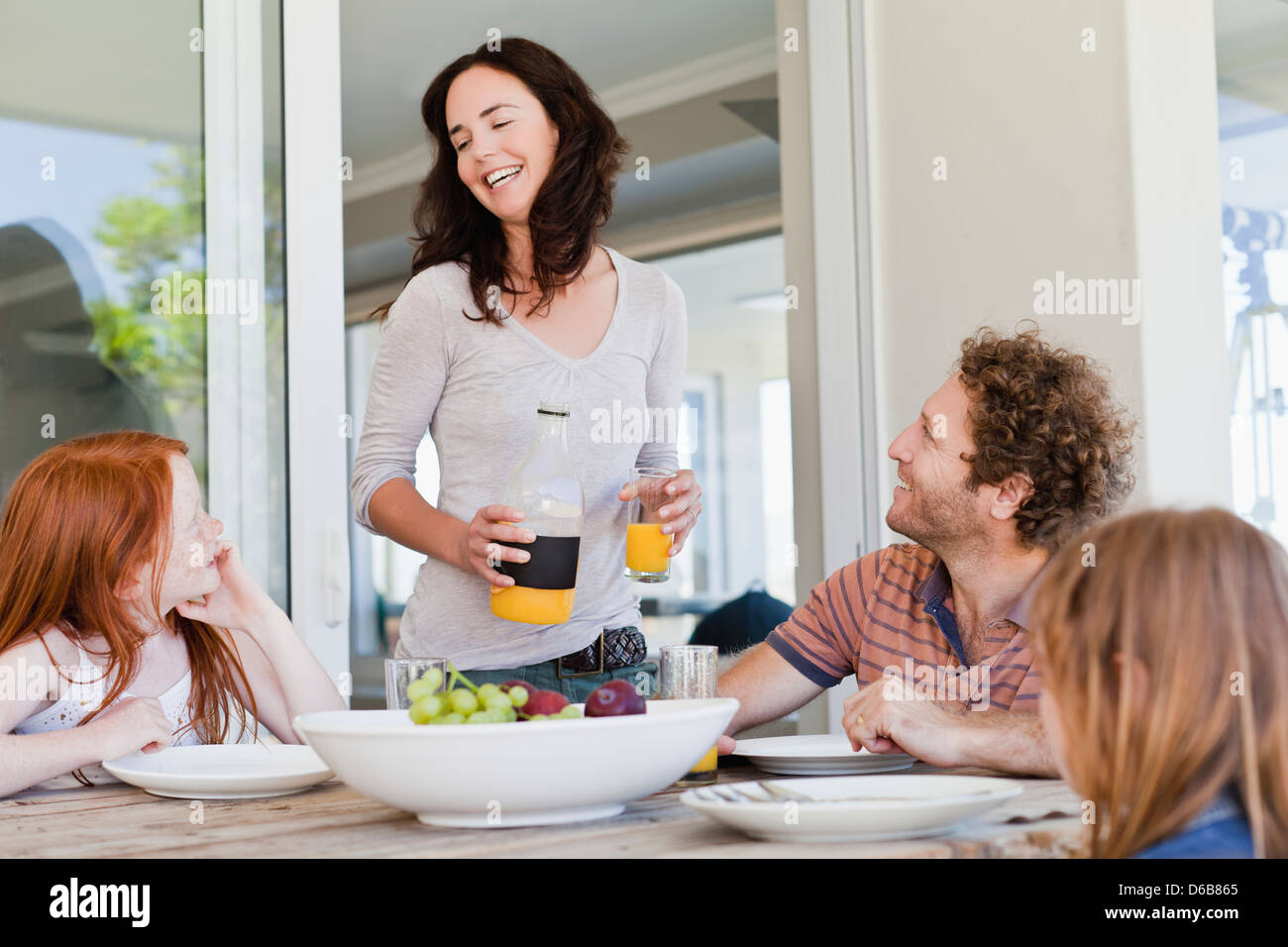 Family having breakfast together Stock Photo - Alamy