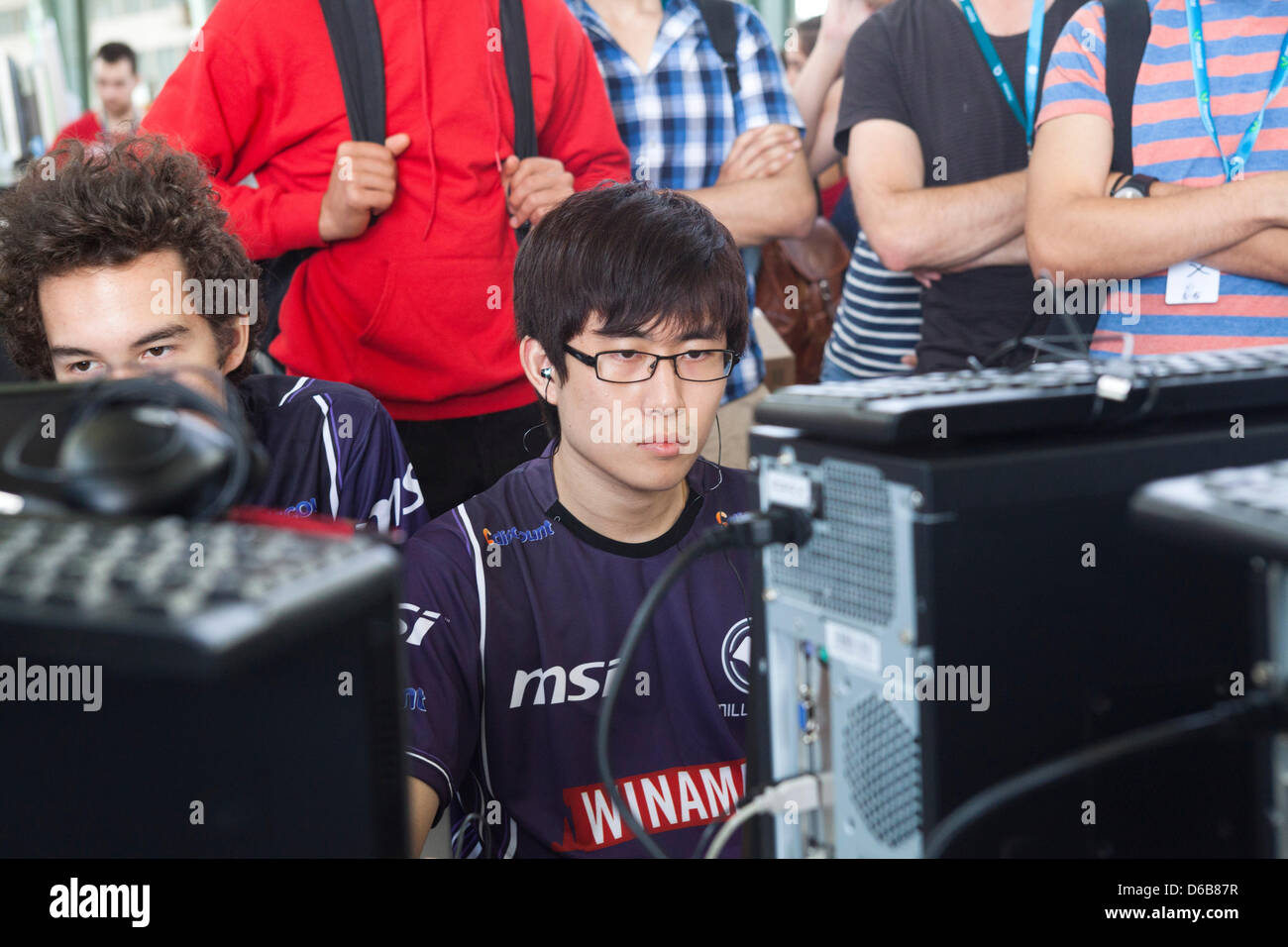 Visitors use computers at the Campus Party Europe in Berlin, Germany ...