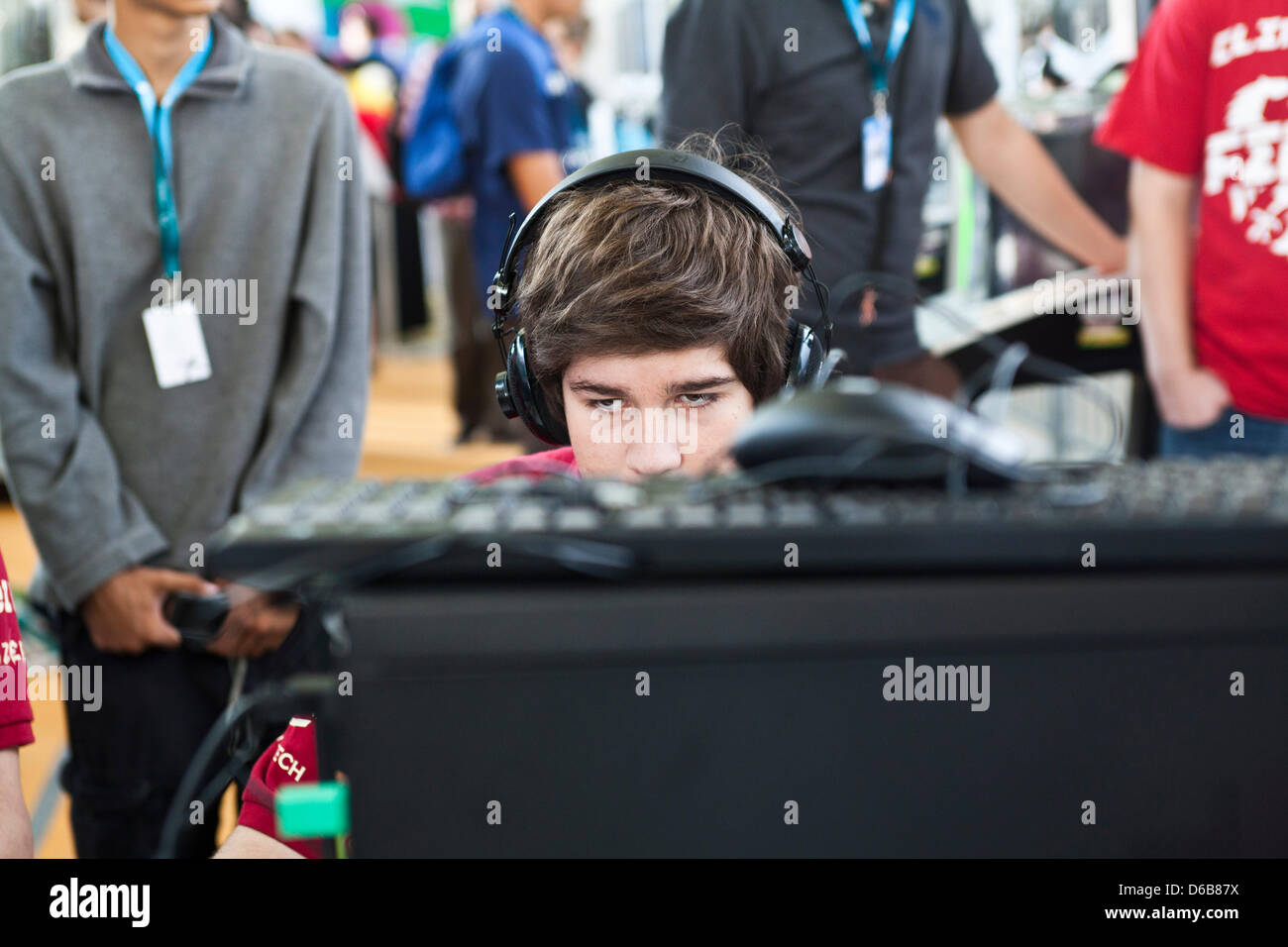Visitors use computers at the Campus Party Europe in Berlin, Germany ...