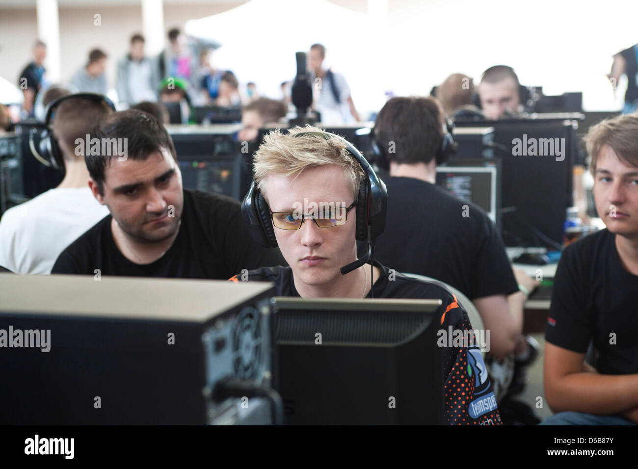 Visitors use computers at the Campus Party Europe in Berlin, Germany ...