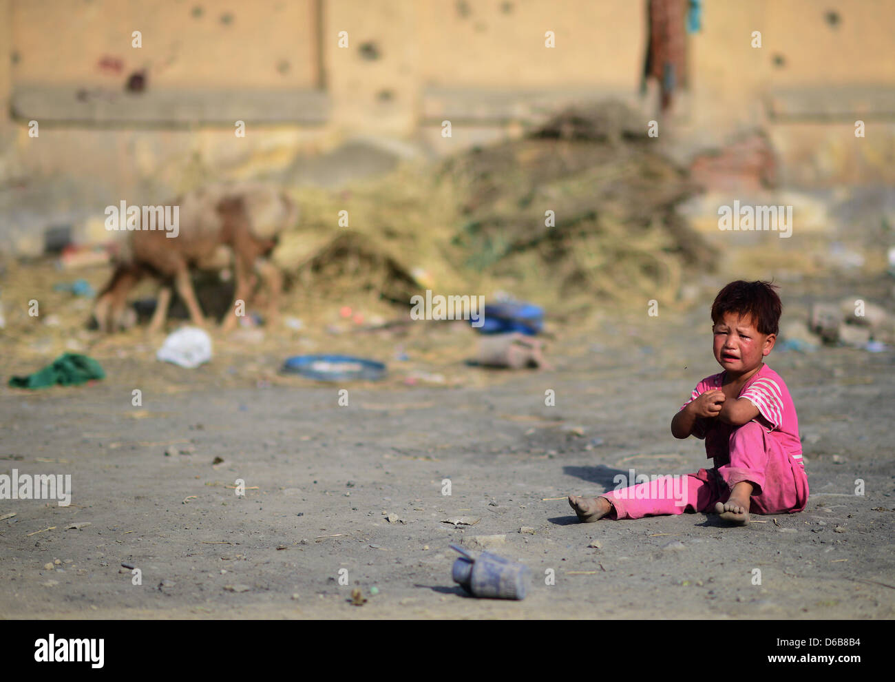 A child cries in the refugee camp Darul-Aman for internally displaced ...