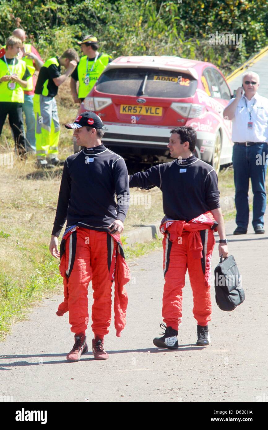 Peruvian rally driver Nicolas Fuchs (L) and his co-pilot Fernando ...