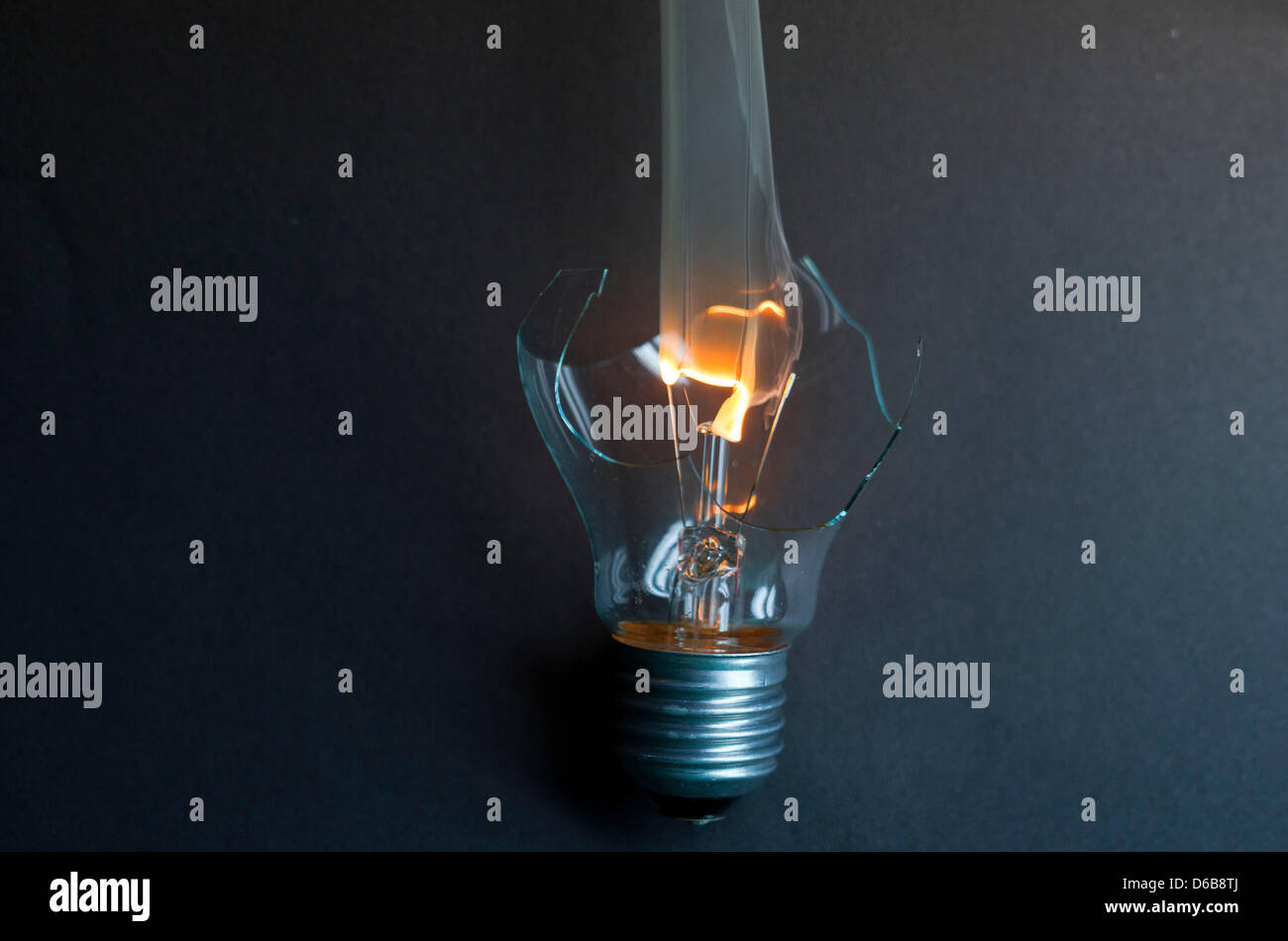 ILLUSTRATION - The filament of a broken 40 W light bulb lights up once ...