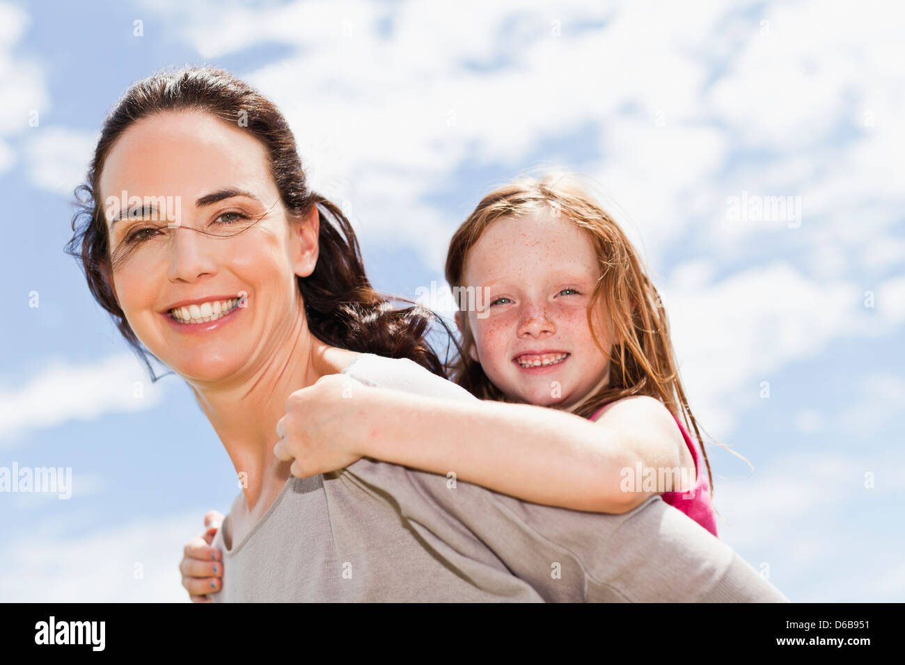 Mother carrying daughter piggyback Stock Photo - Alamy Mother carrying daughter piggyback Stock Photo - Alamy