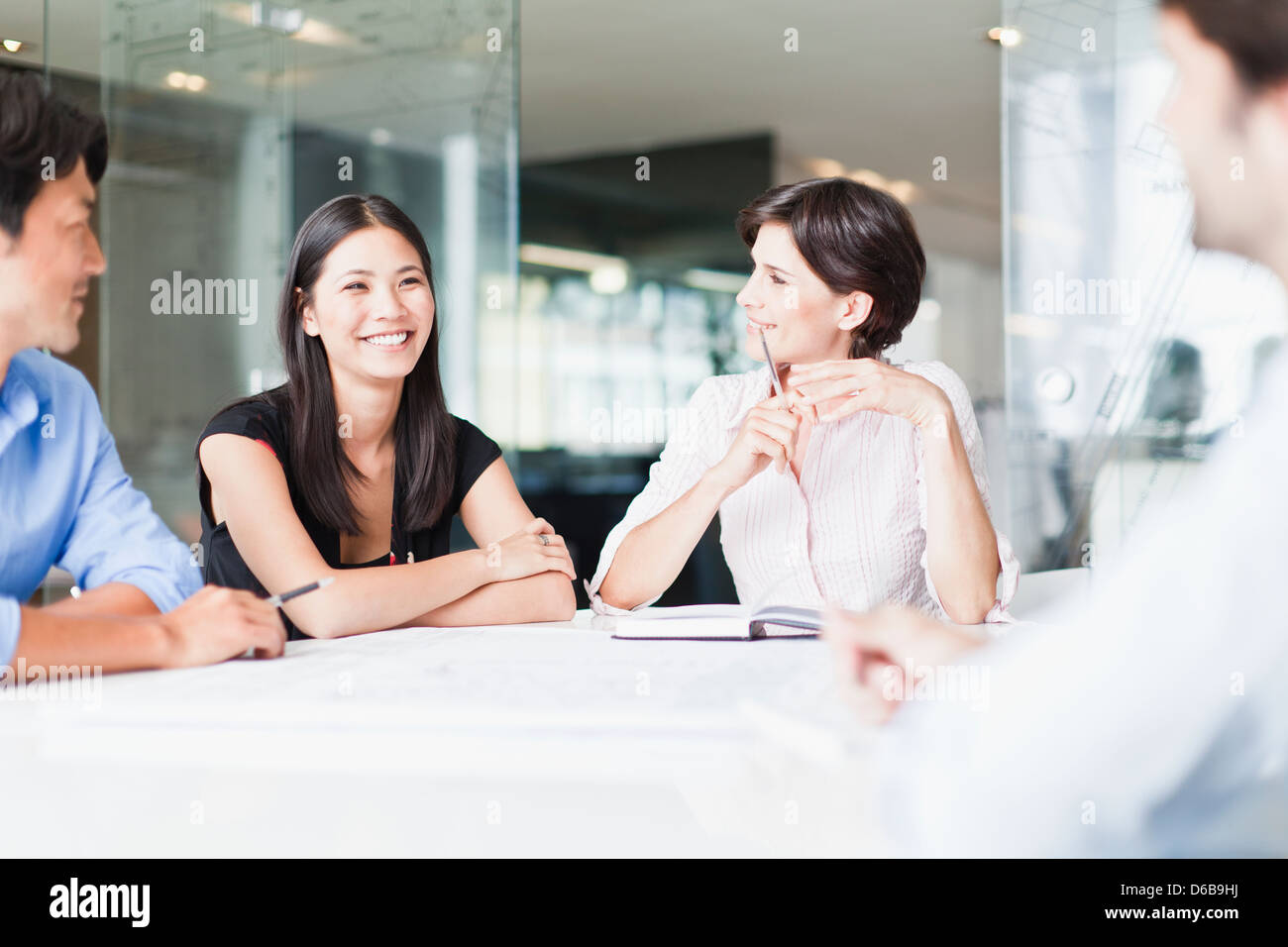 Business people talking in meeting Stock Photo - Alamy