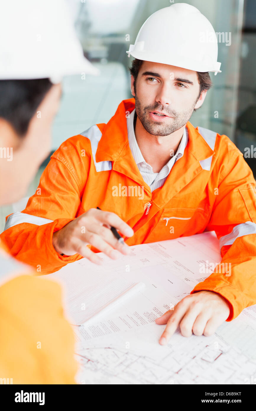 Businessmen reading blueprints Stock Photo - Alamy Businessmen reading blueprints Stock Photo - Alamy
