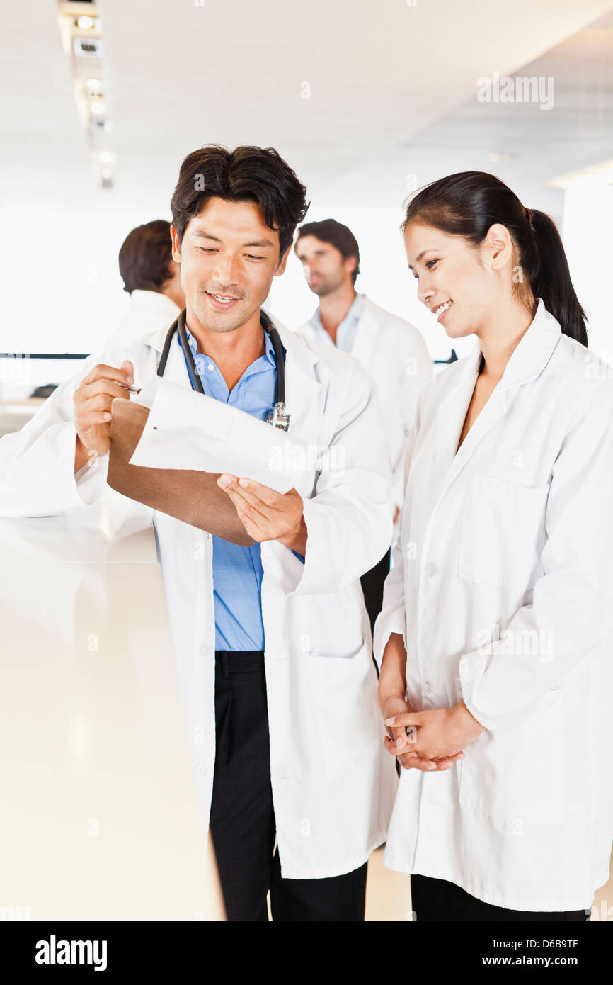 Doctor Reading Chart High Resolution Stock Photography and Images - Alamy