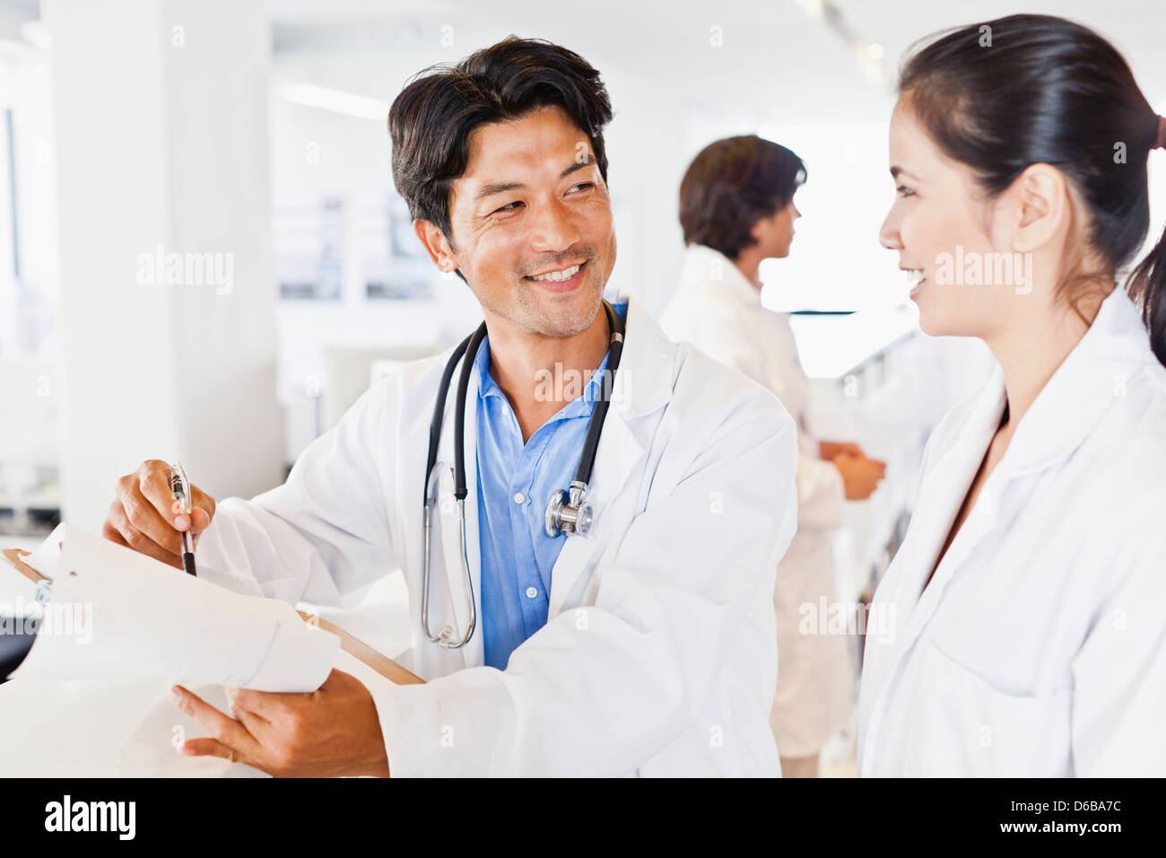 Doctor Reading Chart High Resolution Stock Photography and Images - Alamy