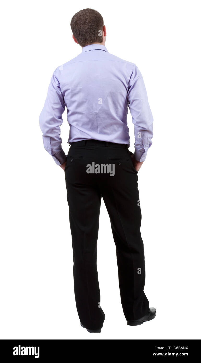 back view of business man looks on wall. Young guy in shirt watching ...