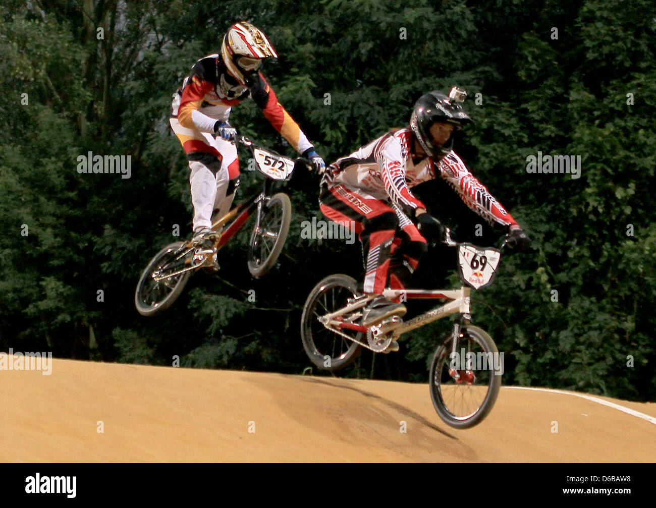 BMX drivers Luis Brethauer of Germany and and French Damien Godet vie ...