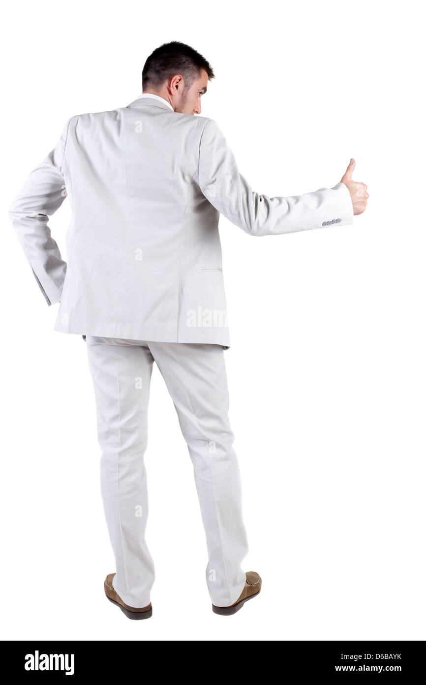 Back view of young business man in white suit going thumb up, isolated ...