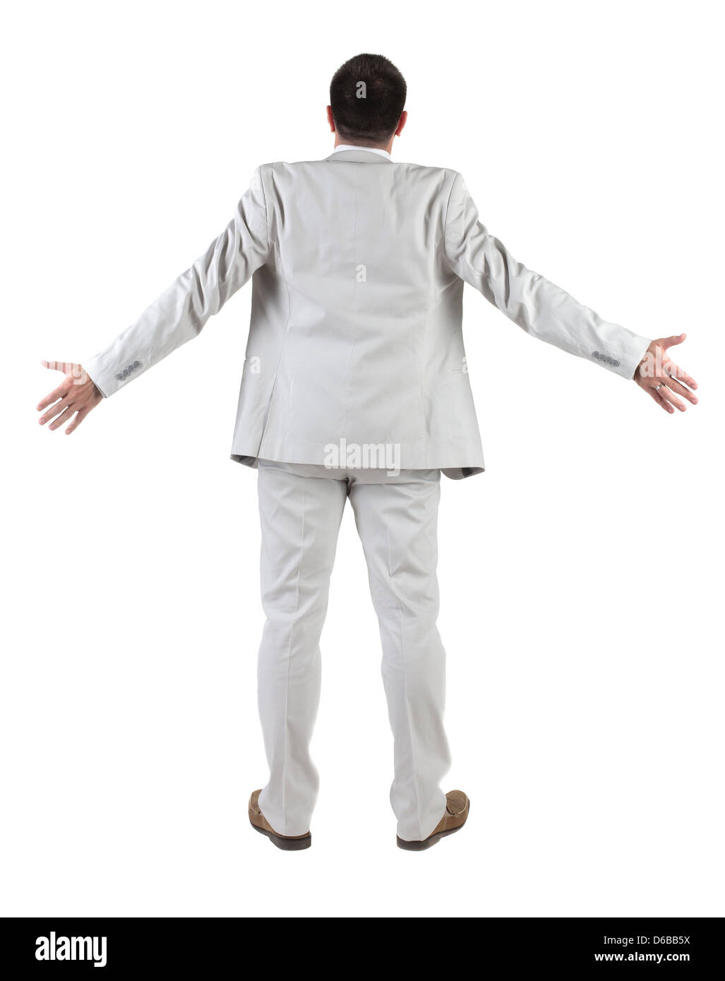 Back view of thinking young business man in white suit. Rear view ...