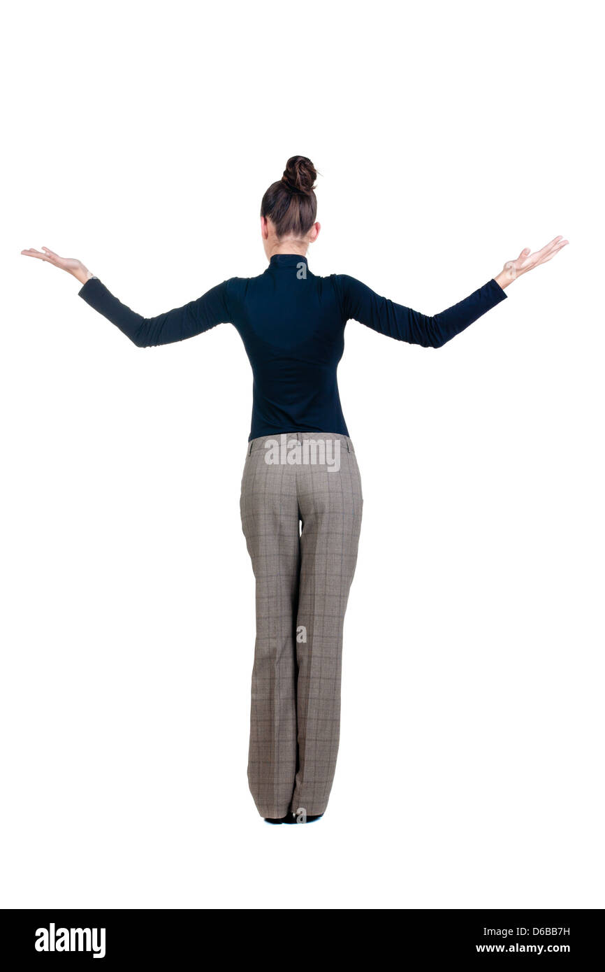 Beautiful young woman . Rear view. Isolated over white background Stock ...