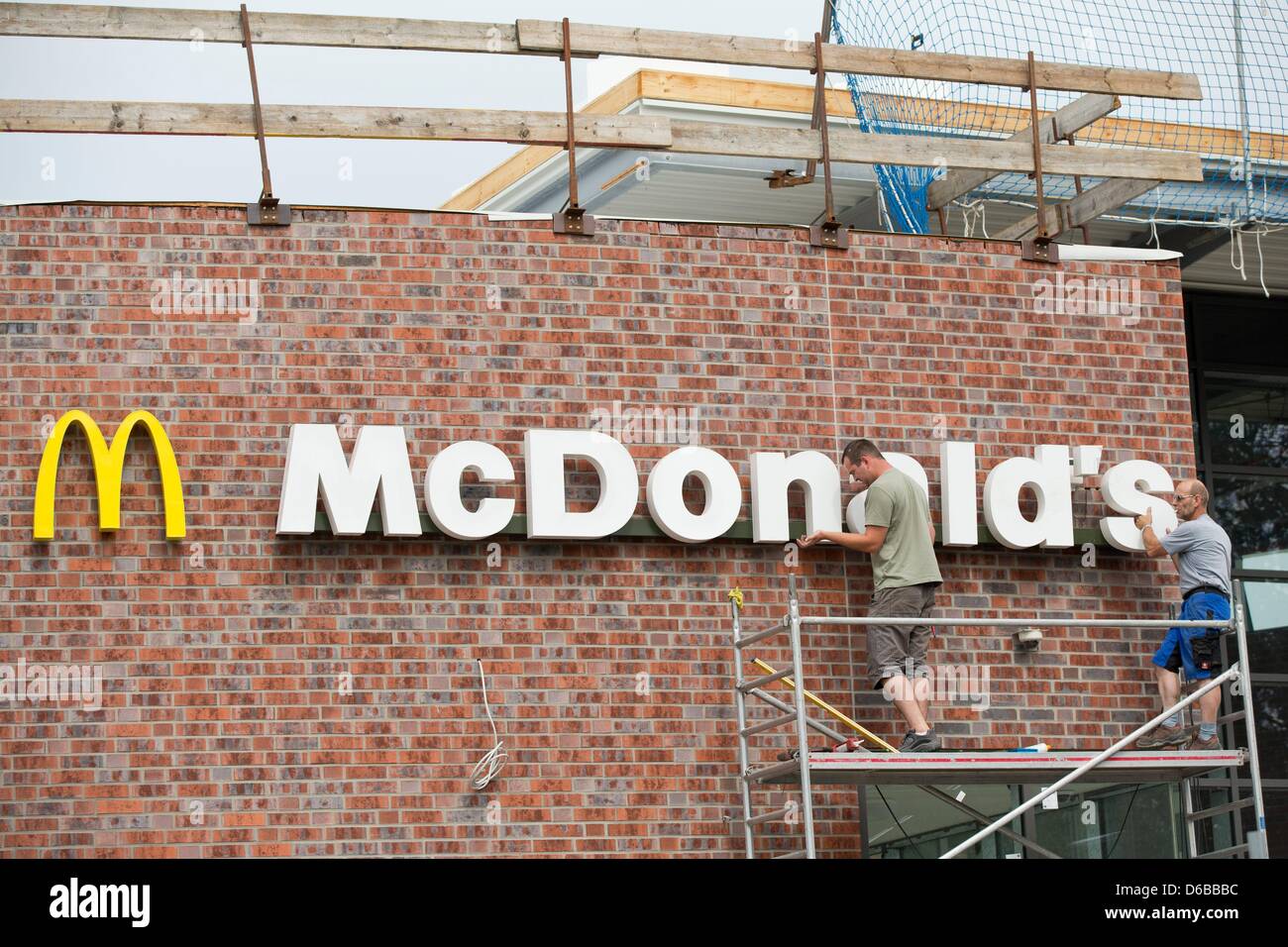 The lettering 'McDonald's' is attached to a new branch of the fast food ...