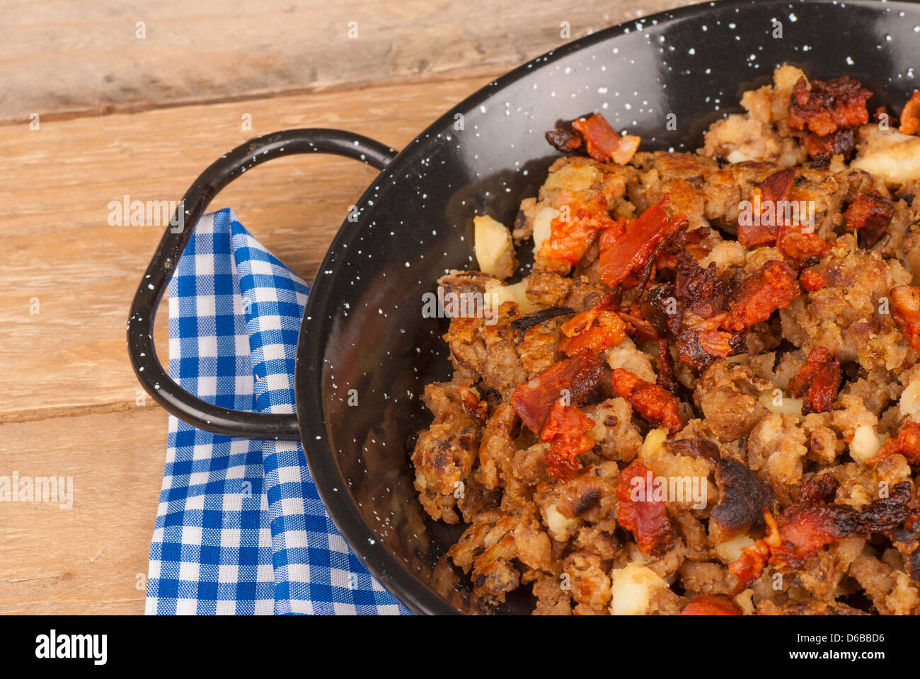 Closeup take of migas, a traditional Spanish meal made with breadcrumbs ...