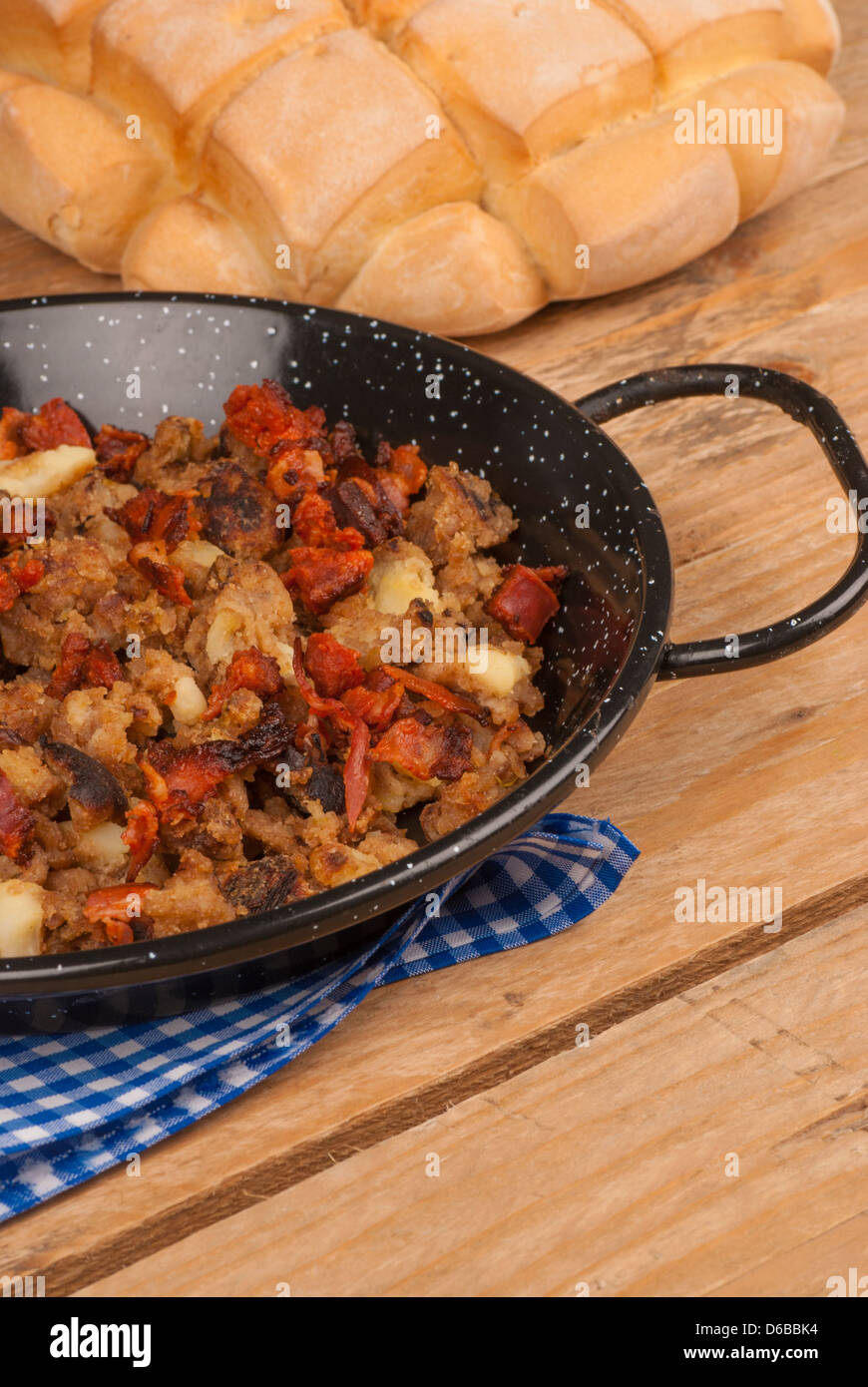 A pan with traditional Spanish migas Stock Photo - Alamy
