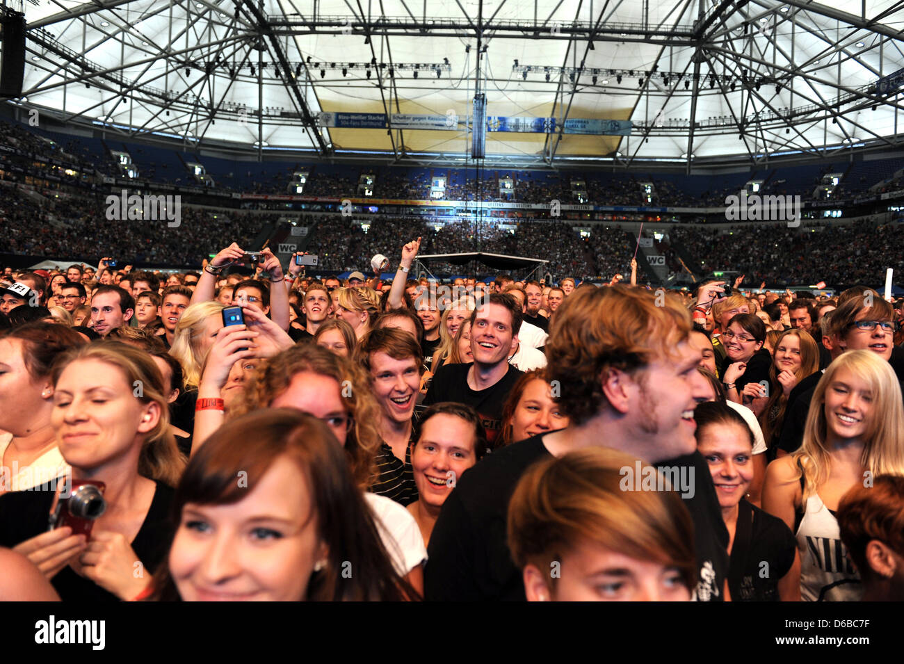 Fans follow the concert of singer Jan Delay performing with his band ...