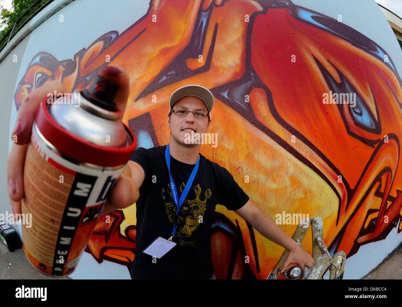 Artist Tarik Yilmaz 'Tiko' sprays a graffiti on one of Germany's ...