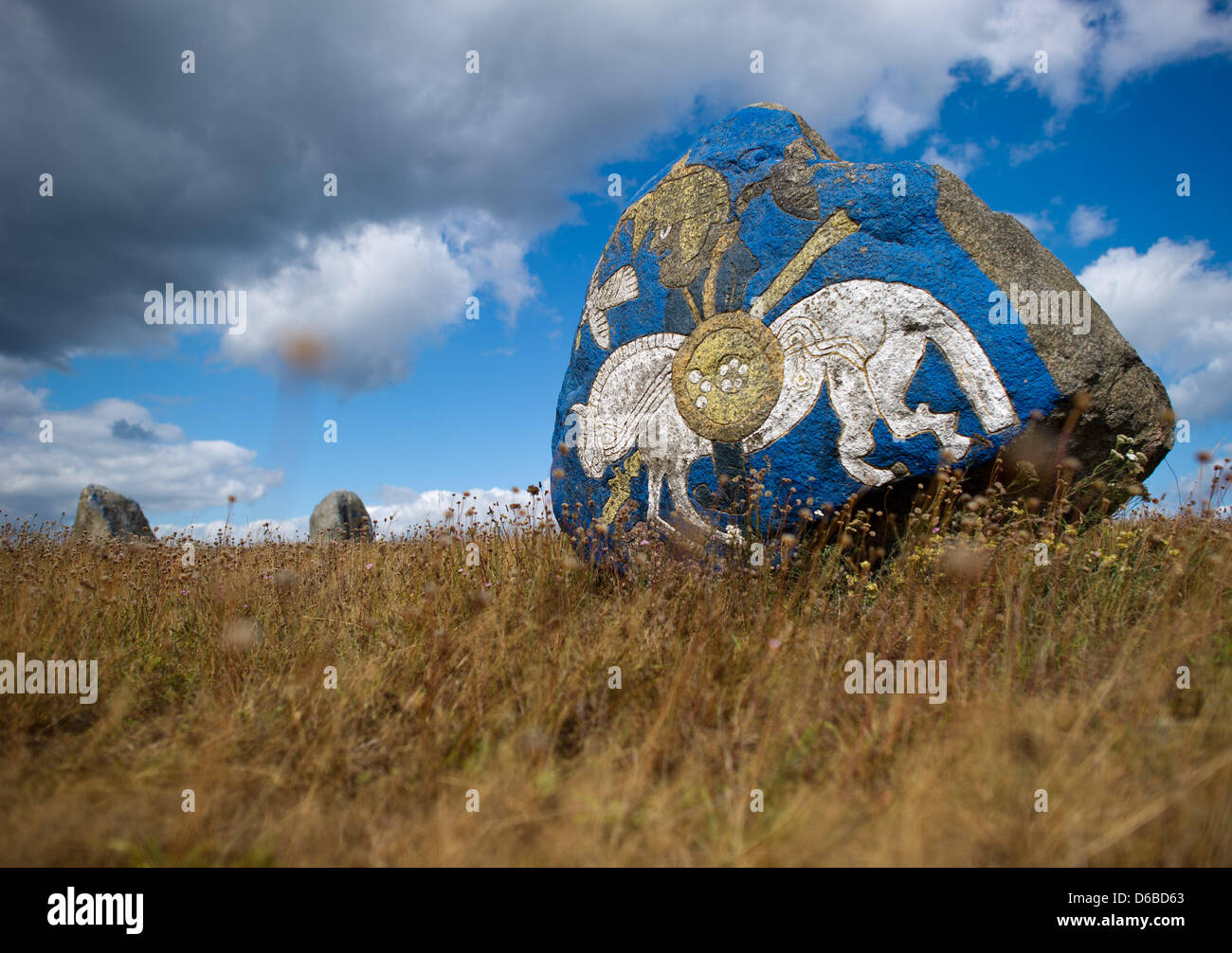 A painting has been painted onto a rock at the Boulder Park in ...