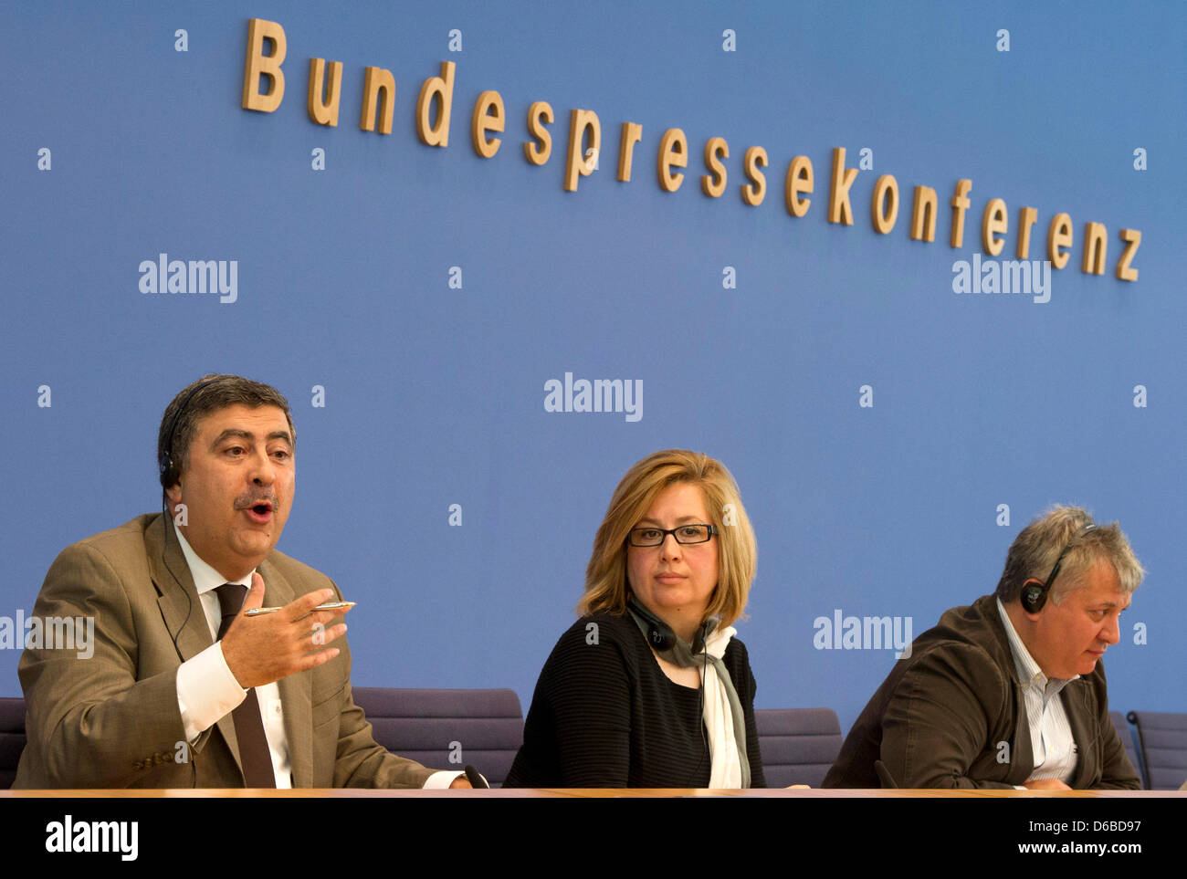 The Syrian Opposition members Murhaf Jouejati (L-R), Afra Jalabi and ...