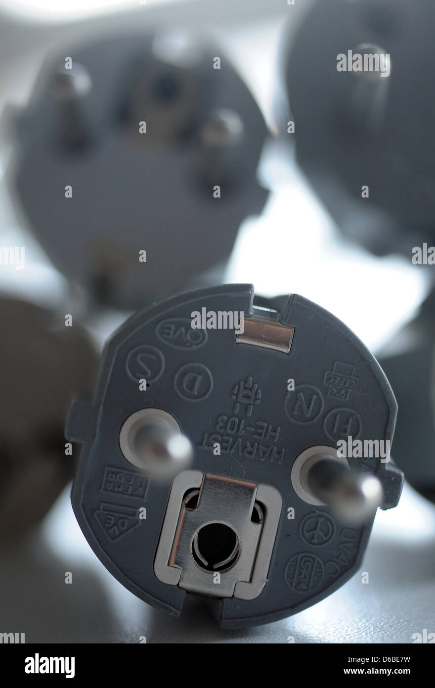 ILLUSTRATION - An illustrated picture shows power plugs lying on a ...