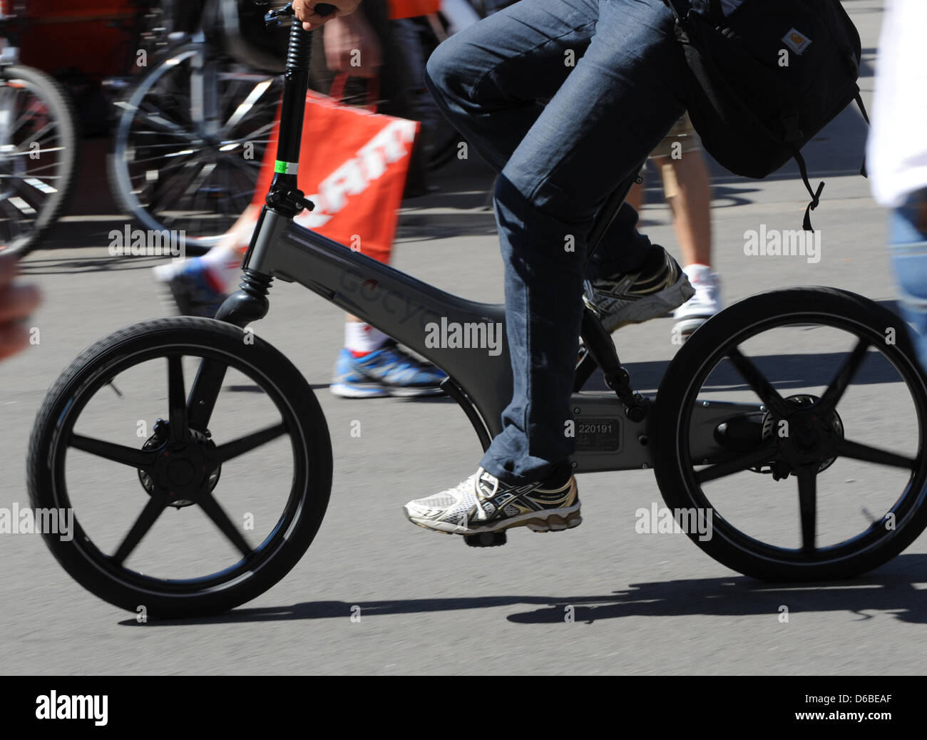 A man rides an electric bicycle at the trade fair Eurobike in ...