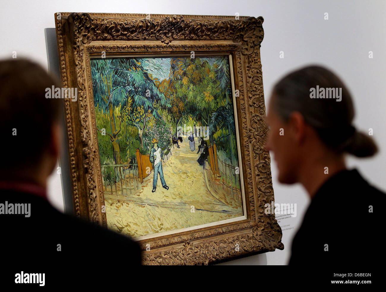 Visitors view the work 'Entrance of Park in Arles' by Vincent van Gogh ...