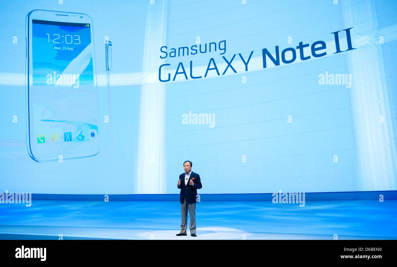 Samsung's mobile chief JK Shin holds a presentation during the IFA ...