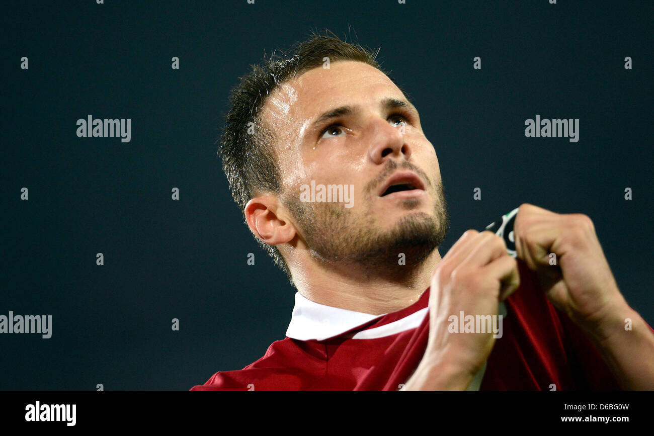 Hanover's Szablocs Huszti celebrates after scoring 2-1 during the UEFA ...