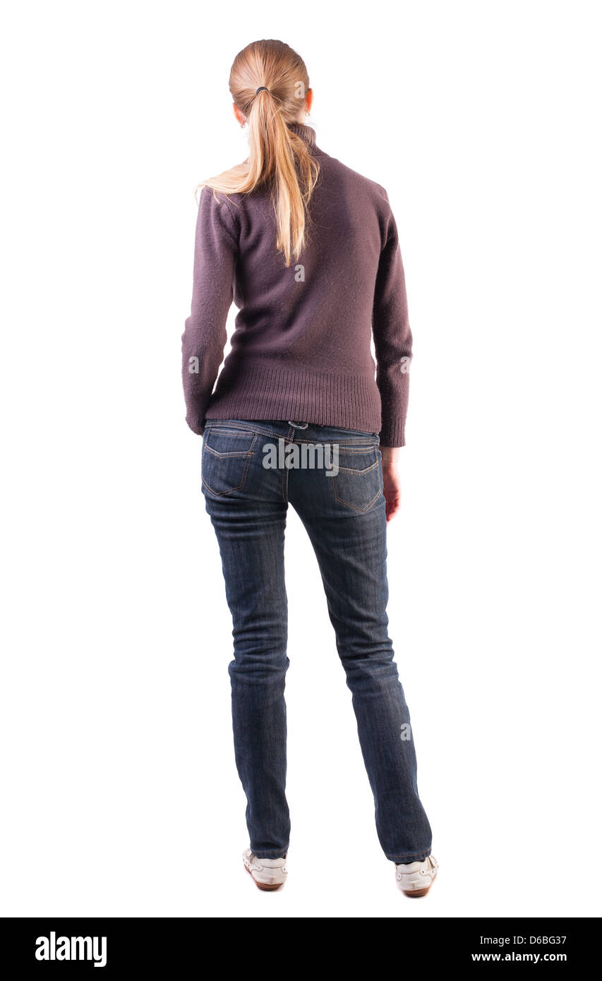 back view of standing young beautiful blonde woman in sweater. girl ...