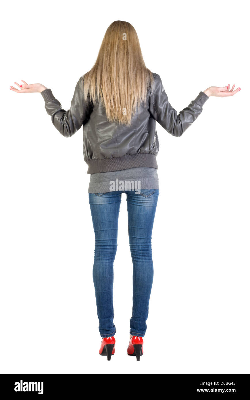 Back view of shocked woman in gray jacket. Upset young blonde girl ...