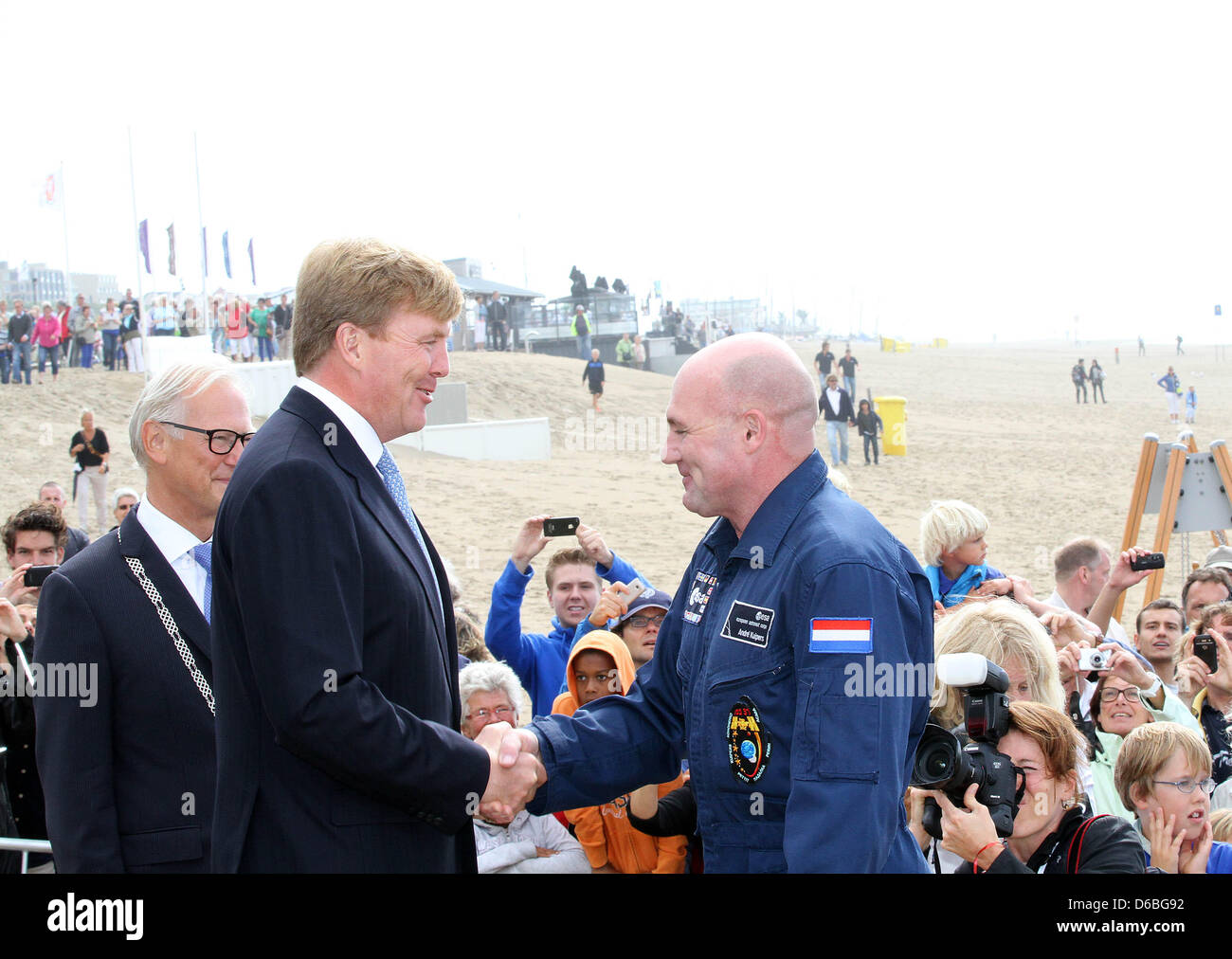 Dutch Crown Prince Willem-Alexander (L) welcomes astronaut Andre ...