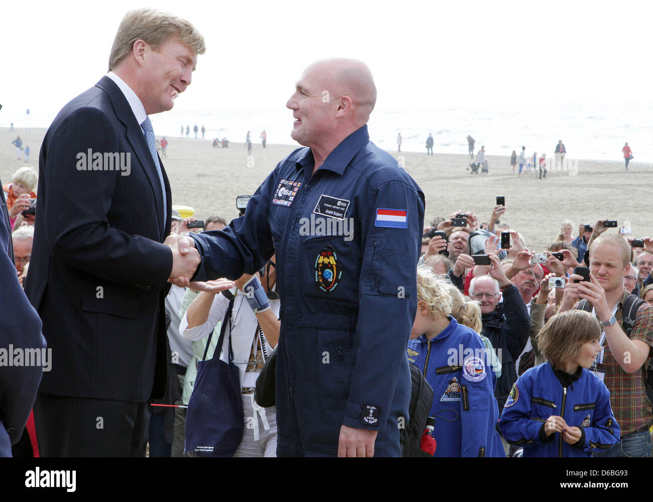 Dutch Crown Prince Willem-Alexander (L) welcomes astronaut Andre ...